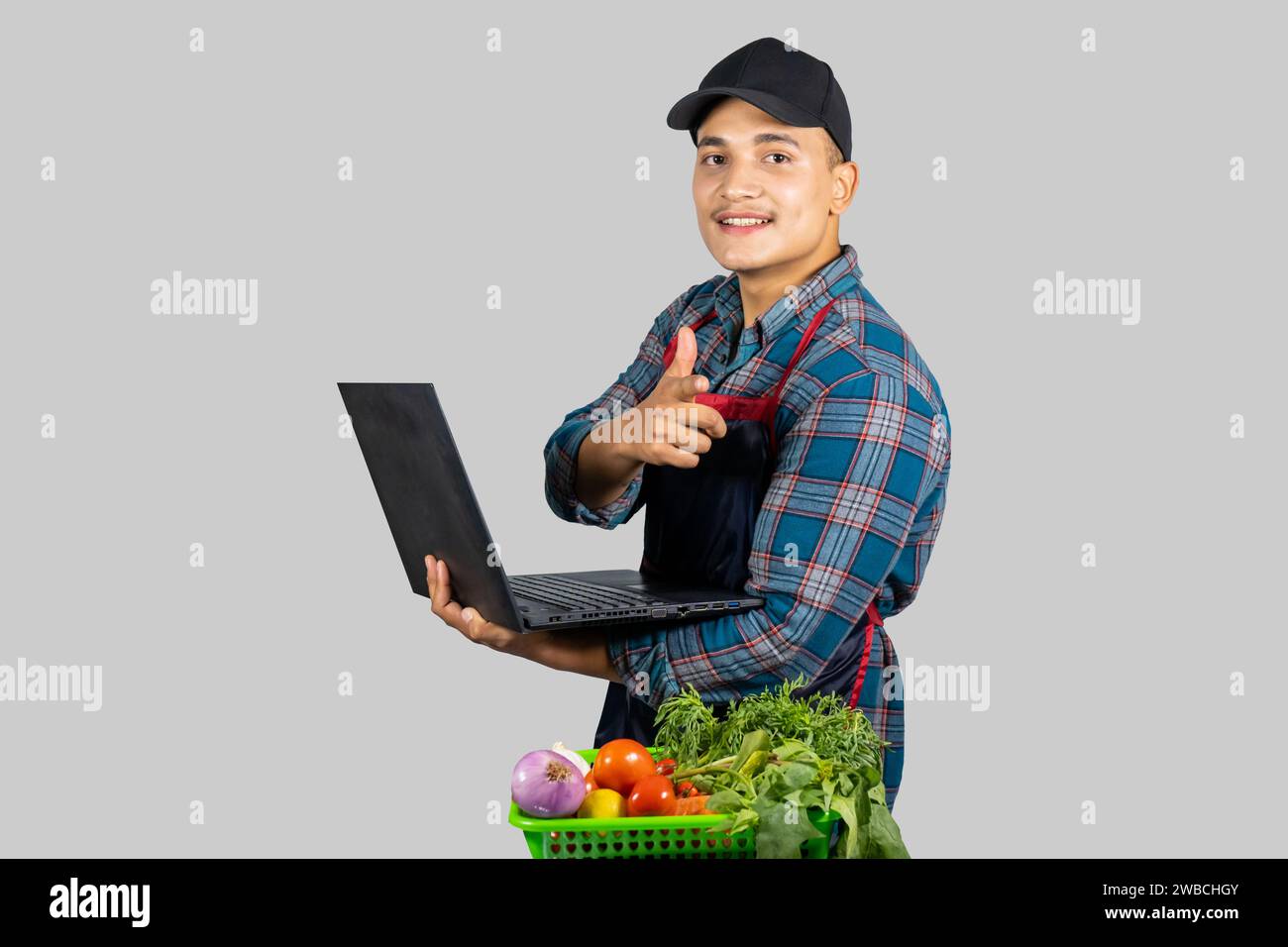 Young Entrepreneur Asian Vegetable Farmer using digital technology ...