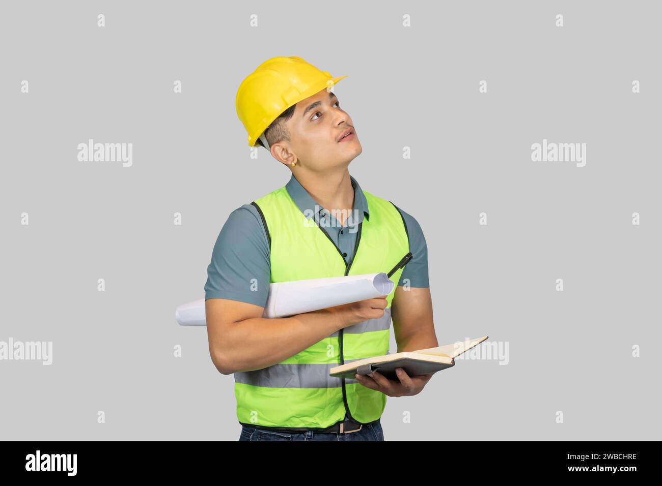 An Asian Happy Construction Worker Engineer giving expression gestures ...
