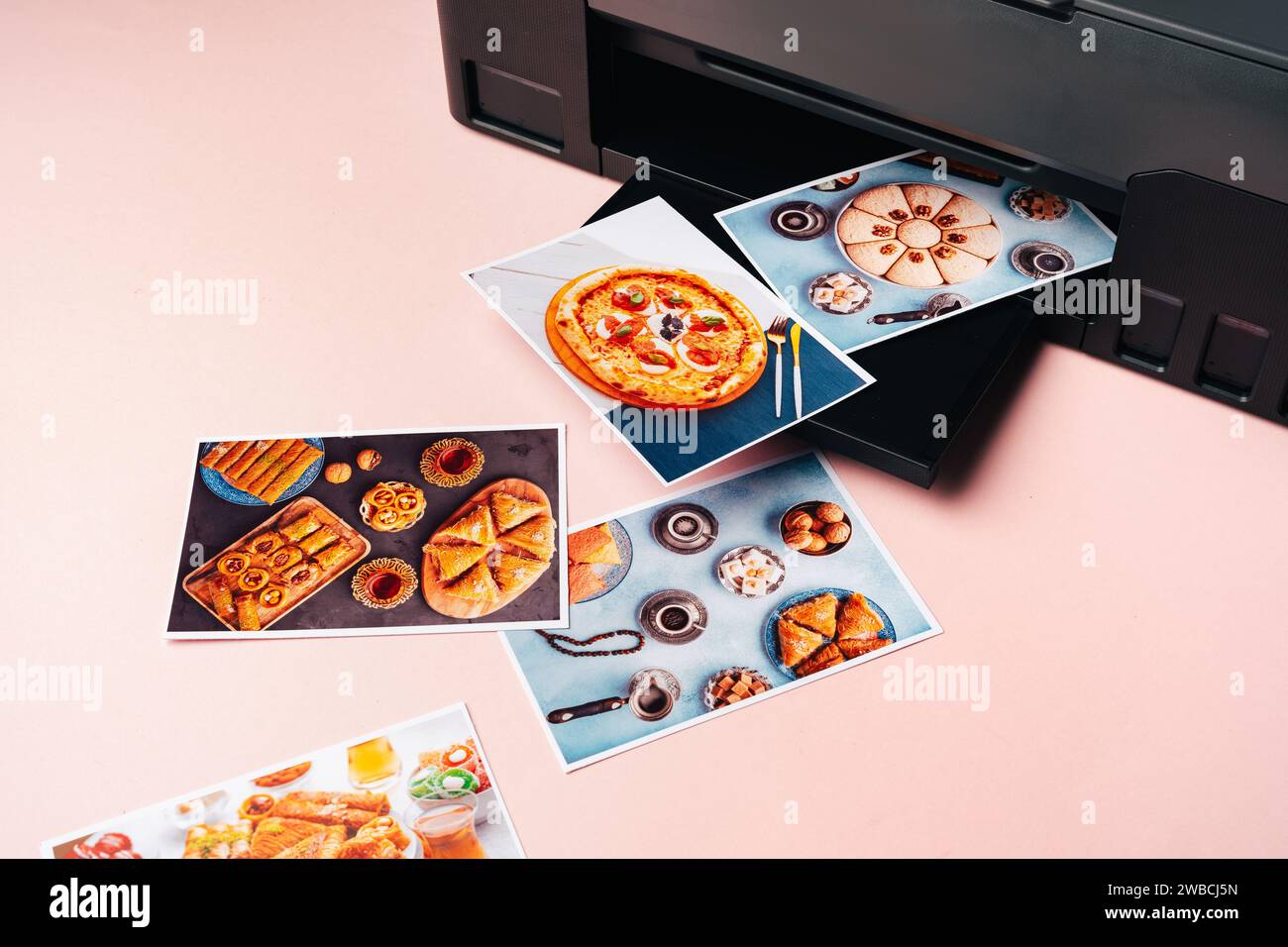Modern laser printer printing color photos of food close up Stock Photo ...