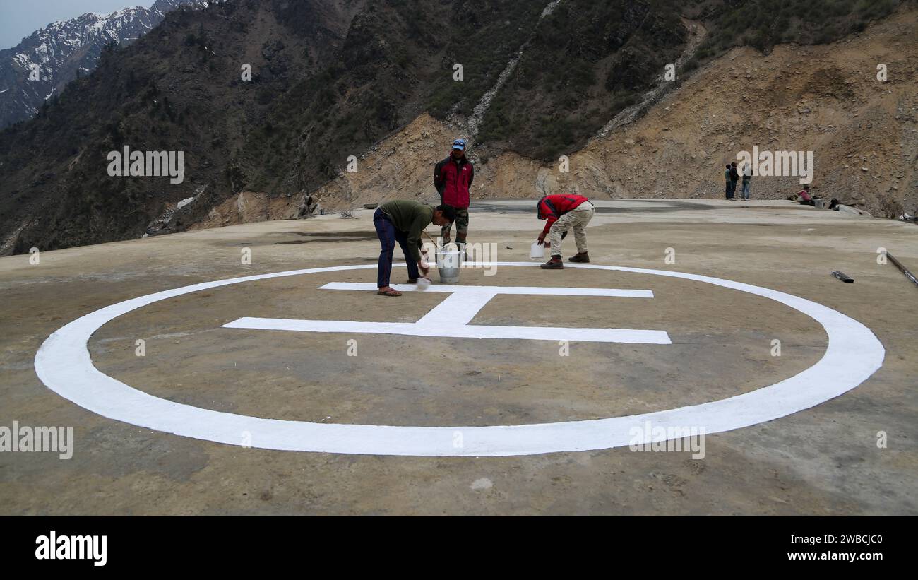 Rudarprayag, Uttarakhand, India, May 18 2014, Helipad painting with H ...