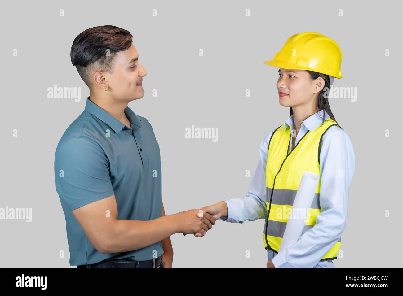 Asian Couple Engineer and Architect giving gestures and expressions on ...