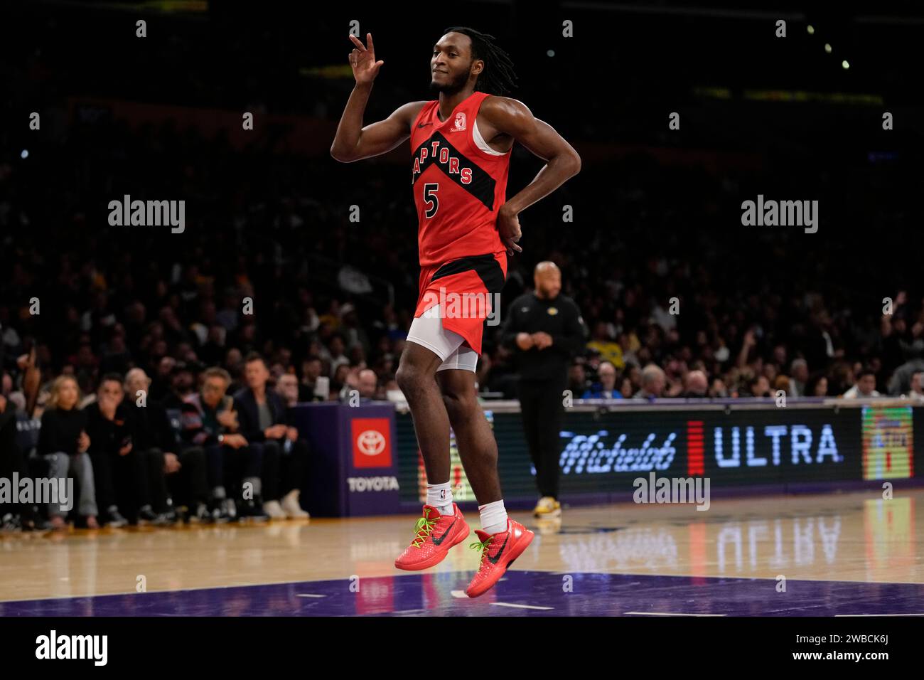 Toronto Raptors guard Immanuel Quickley (5) celebrates after a 3 ...