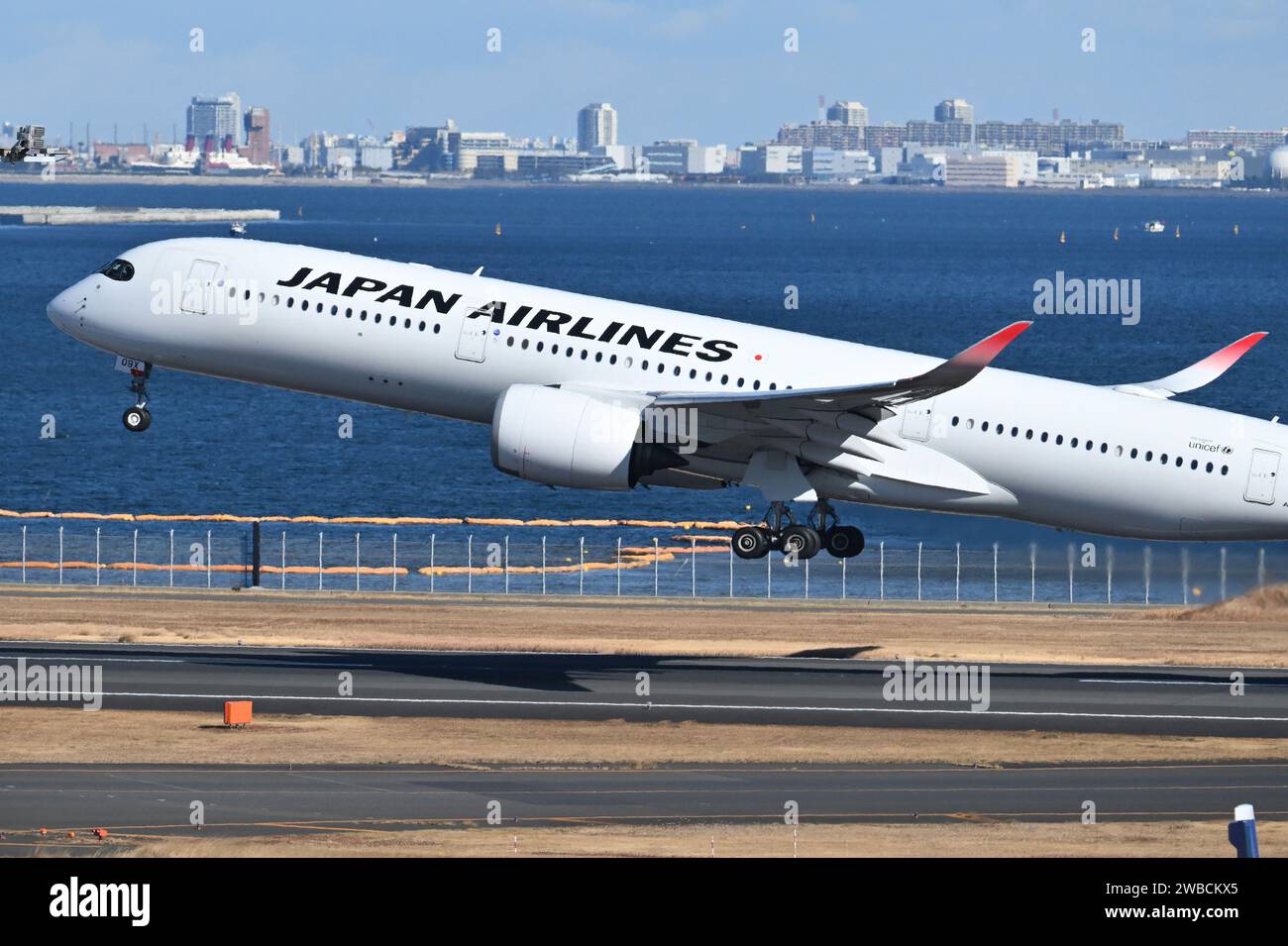 Airbus A350-900 (reg. JA09XJ) of JAL flight JL513 to Sapporo New Chitose taking off on the first ...