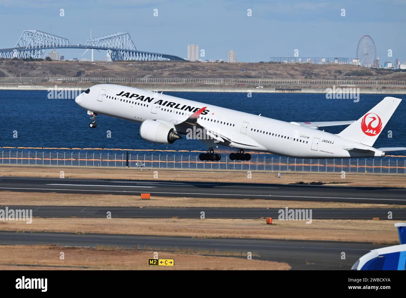 Airbus A350-900 (reg. JA04XJ) of JAL flight JL517 to Sapporo New Chitose taking off on the first ...