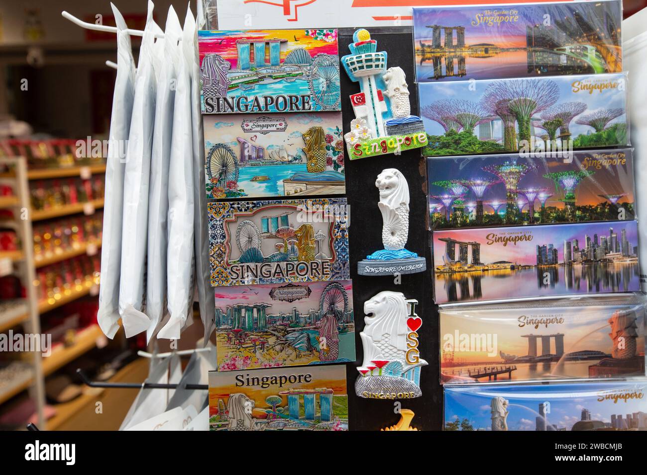 Souvenir magnets of popular destinations such as Merlion, Marina Bay ...