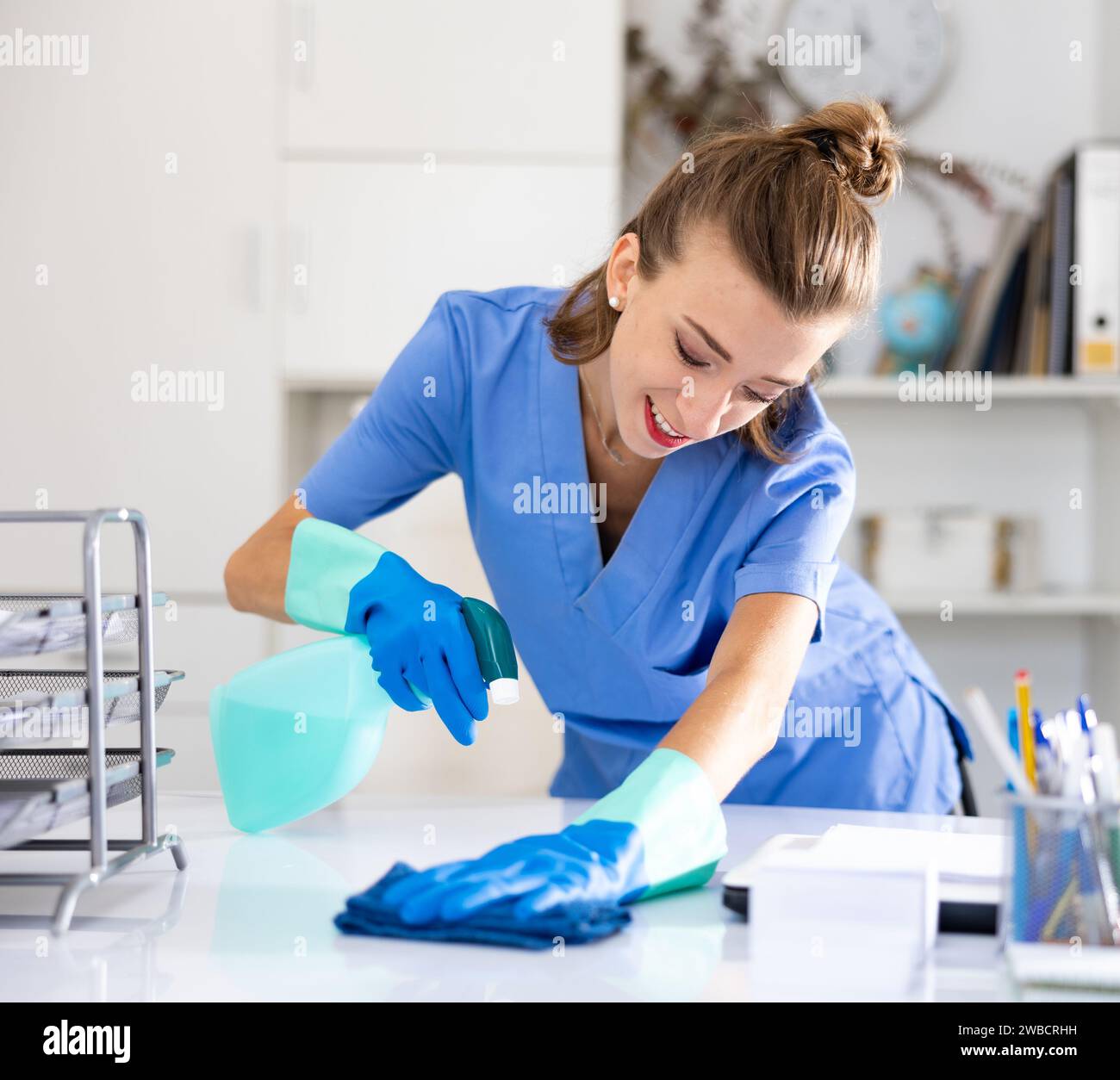Cheerful cleaning lady wipes hi-res stock photography and images - Alamy