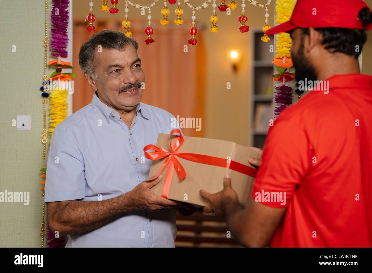 Elderly indian man customer hi-res stock photography and images - Alamy