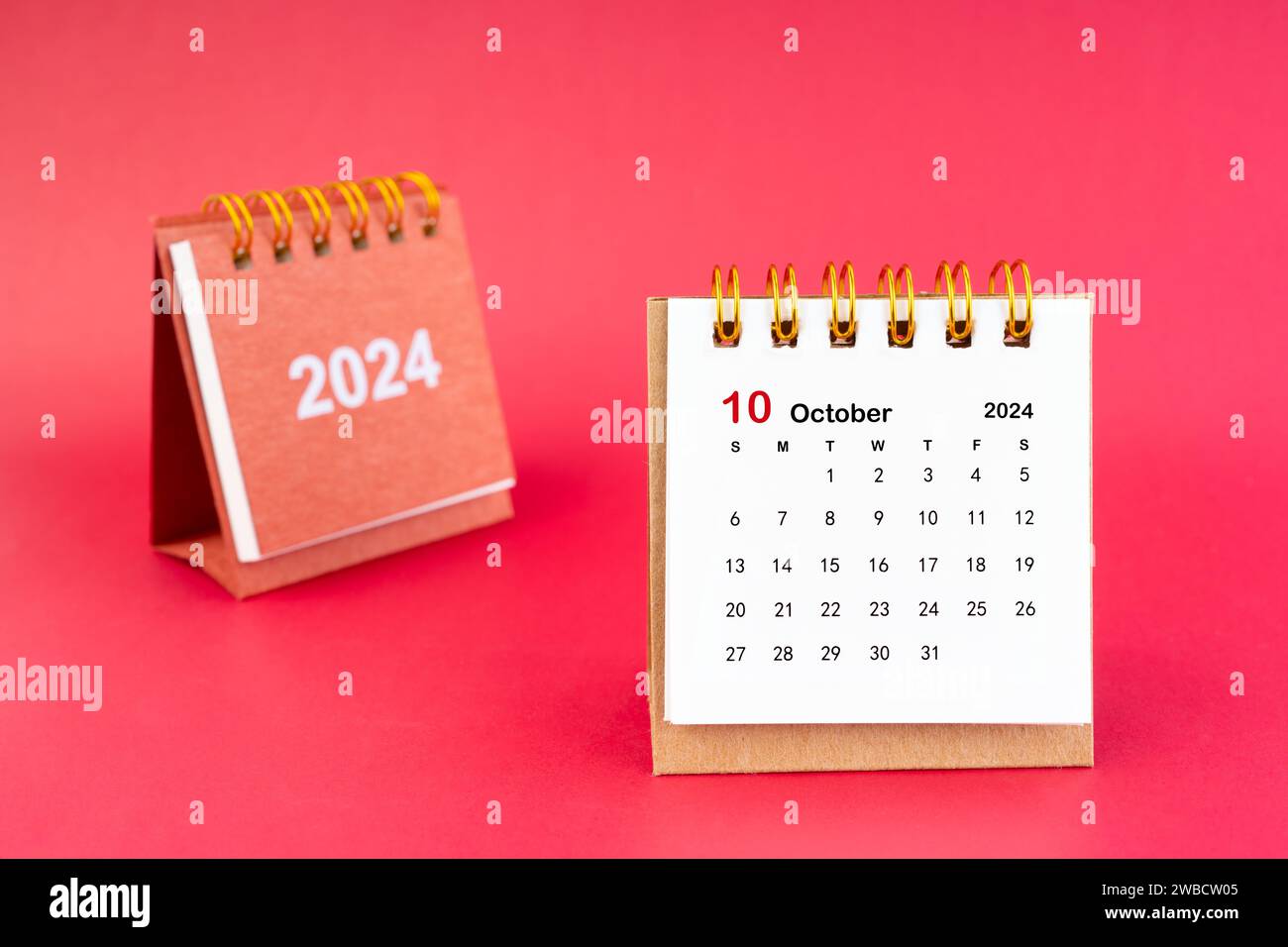 2024 October Mini Calendar On Red Color Background Stock Photo - Alamy