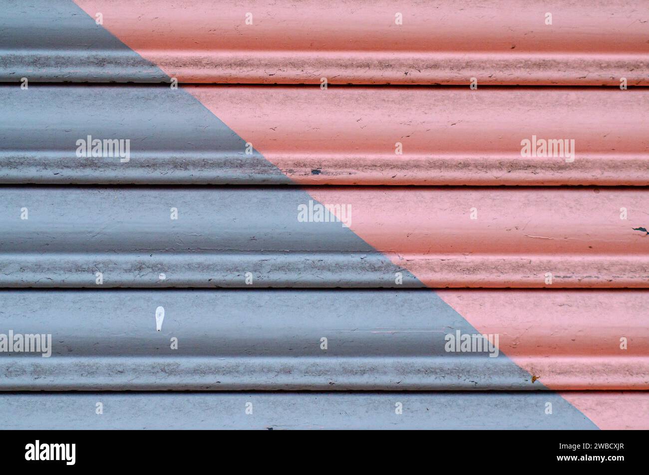 pink and gray painted metal shutter Stock Photo - Alamy