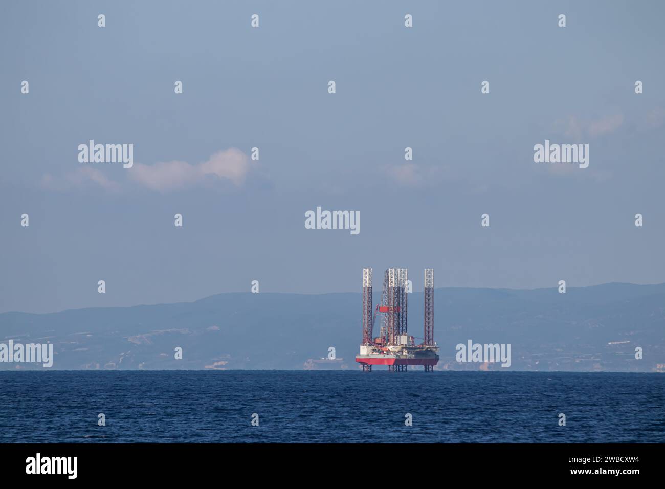 Oil refinery platform at the open sea, producing black gold, Aegean Sea ...