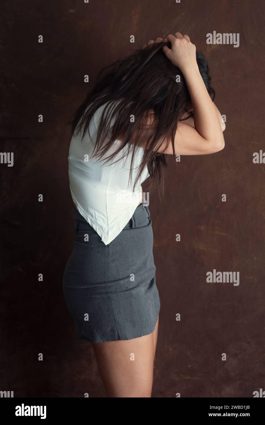 Side view of stressed woman head in hands Stock Photo - Alamy