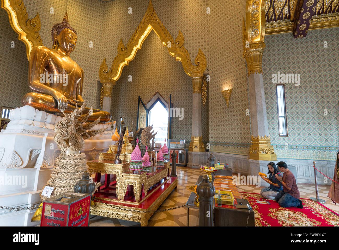 Bangkok, Thailand - Dec 6, 2023: The interior of Wat Traimit Withayaram ...