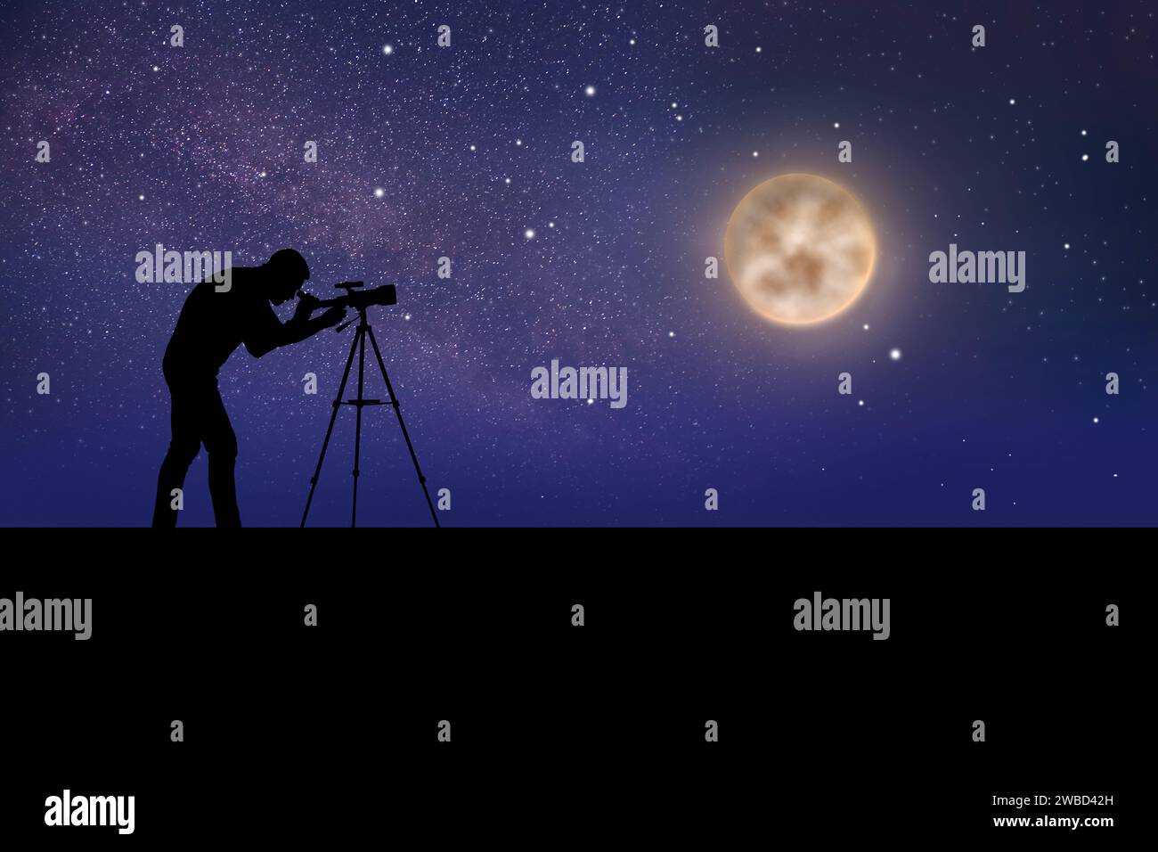 Astronomer looking at moon and stars through telescope outdoors Stock ...