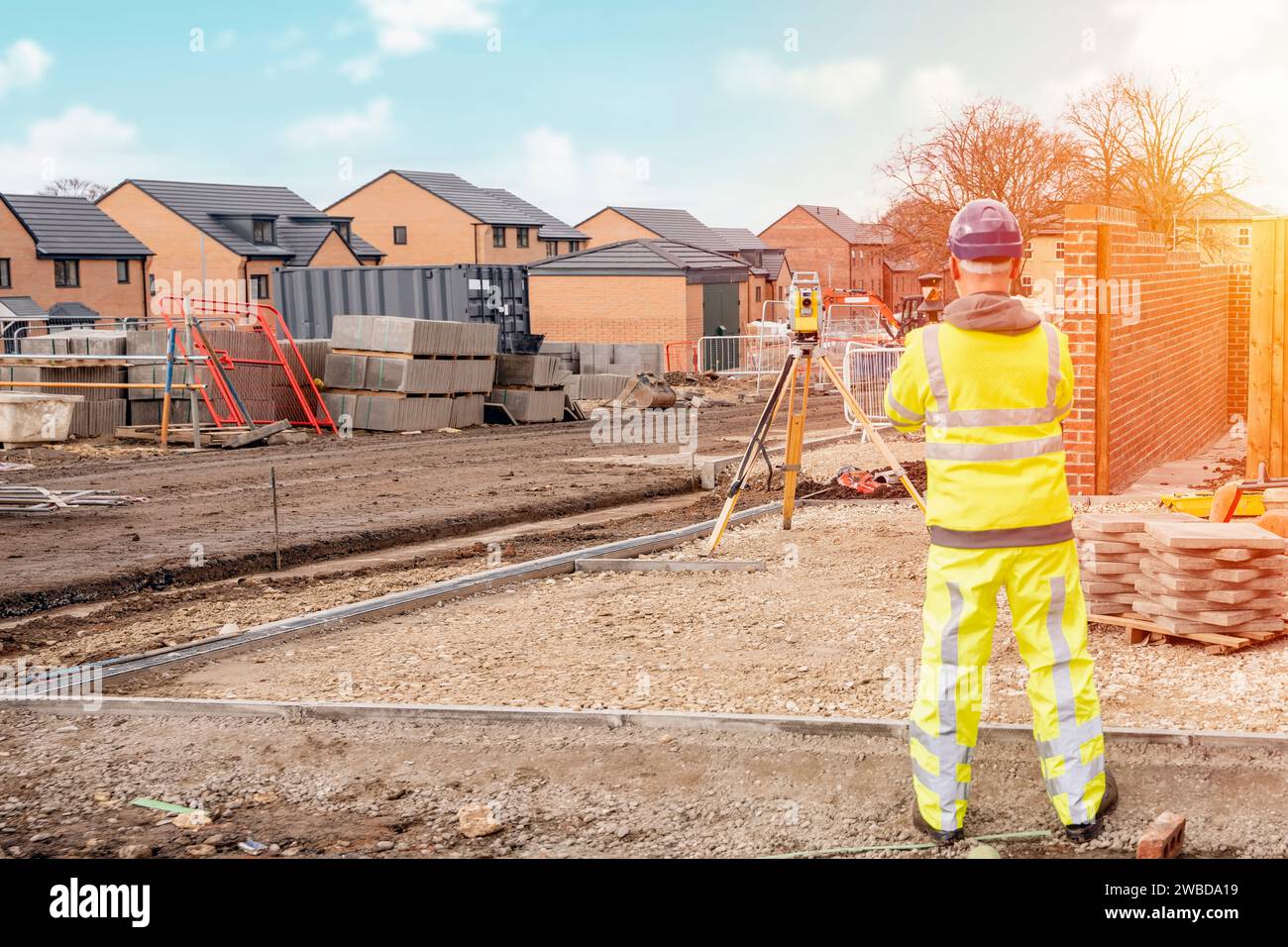 Surveyor builder site engineer with theodolite total station at ...