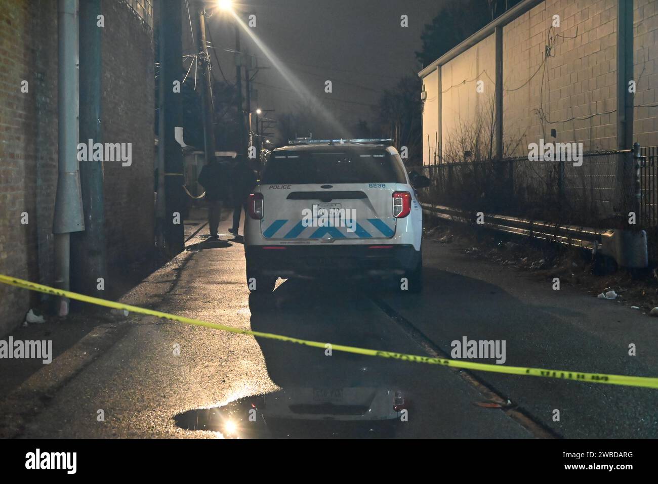 Chicago police on the scene of the homicide. Chicago police process a ...