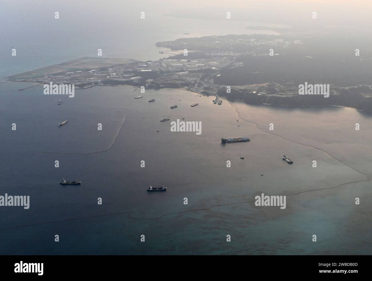 An aerial photo taken from a jetliner shows a barge ship operated by ...