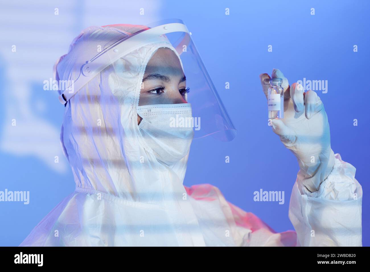 Female Scientist Holding Vial Stock Photo - Alamy