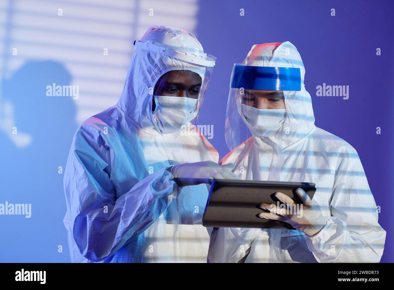 Hazmat suits blue hi-res stock photography and images - Alamy