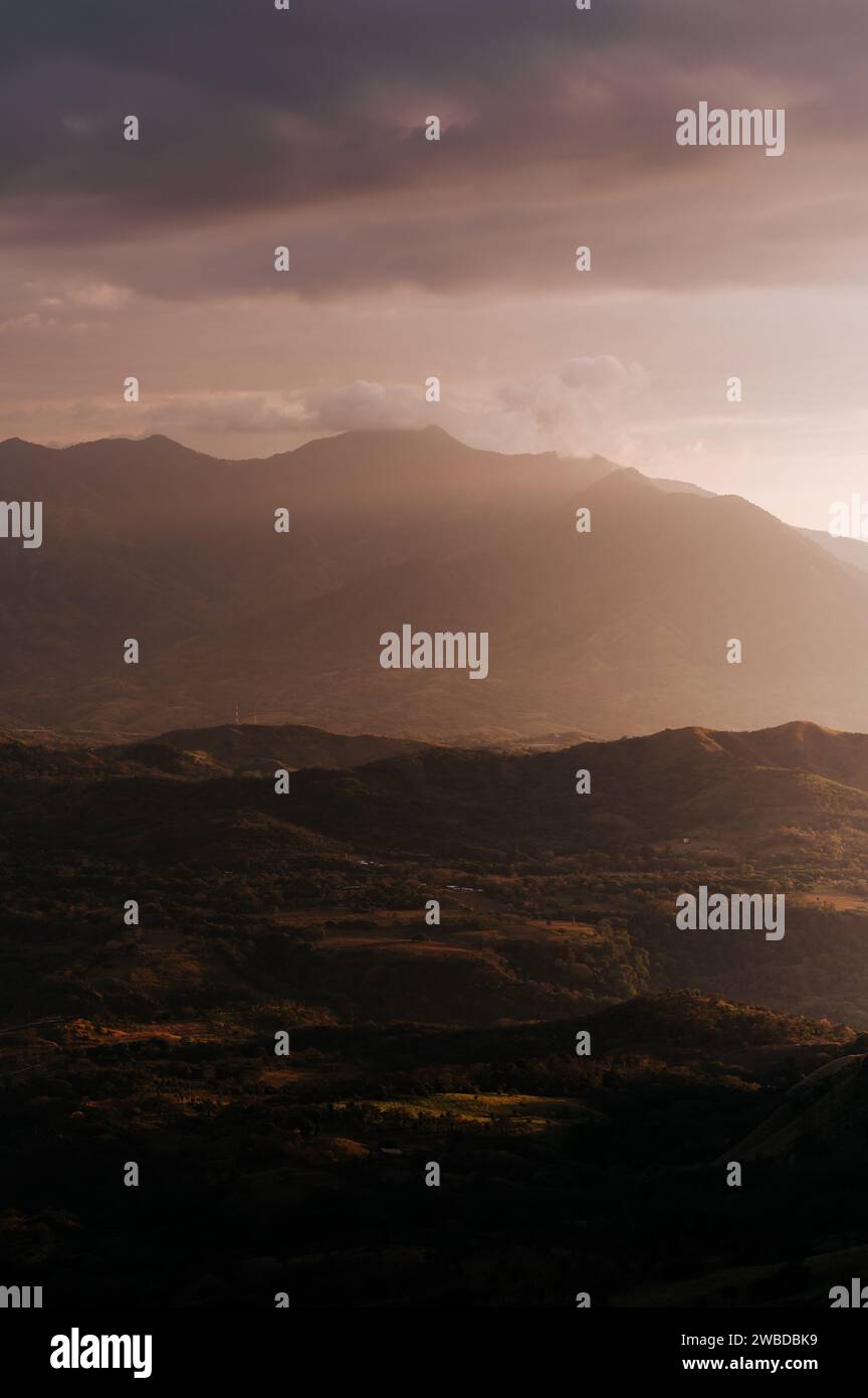 A vertical of stunning sunset view in the mountains of Costa Rica Stock ...