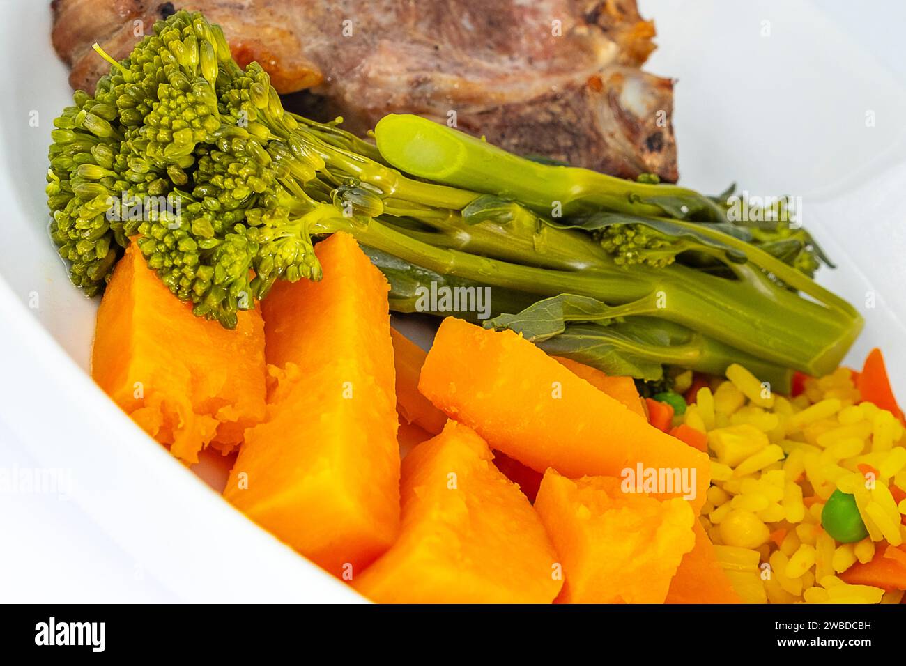 Tender Stem Broccolli Sweet Potatoe and Savoury Rice with a Lamb Chop ...