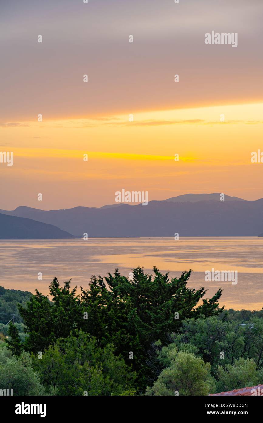 Dawn breaking behind the mountains of Mainland Greece from the Island ...