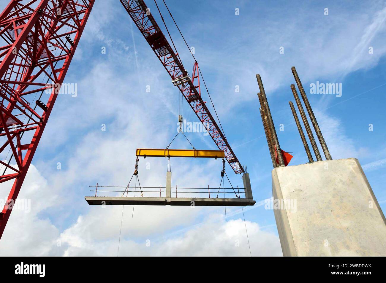 Crane lifting pre cast concrete panels on a UK construction site Stock ...