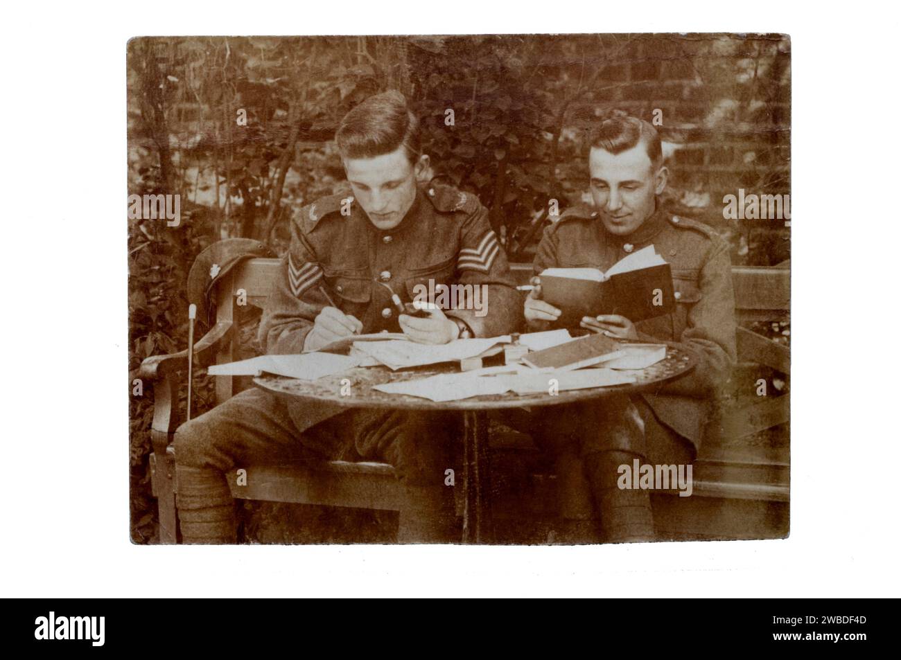 WWI Soldiers Reading & Writing Stock Photo - Alamy