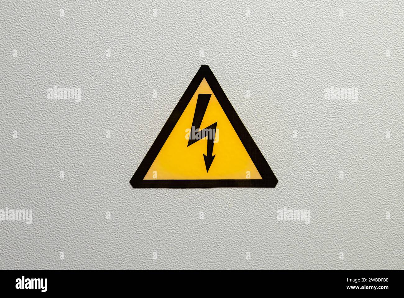 Triangular danger sign (black lightning on yellow background Stock ...