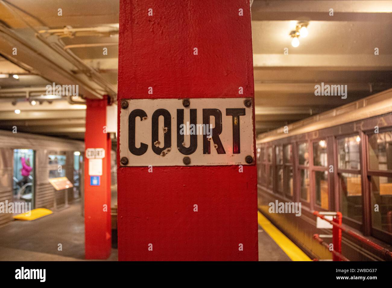A sign on a red pillar at the subway station in the New York Transit ...