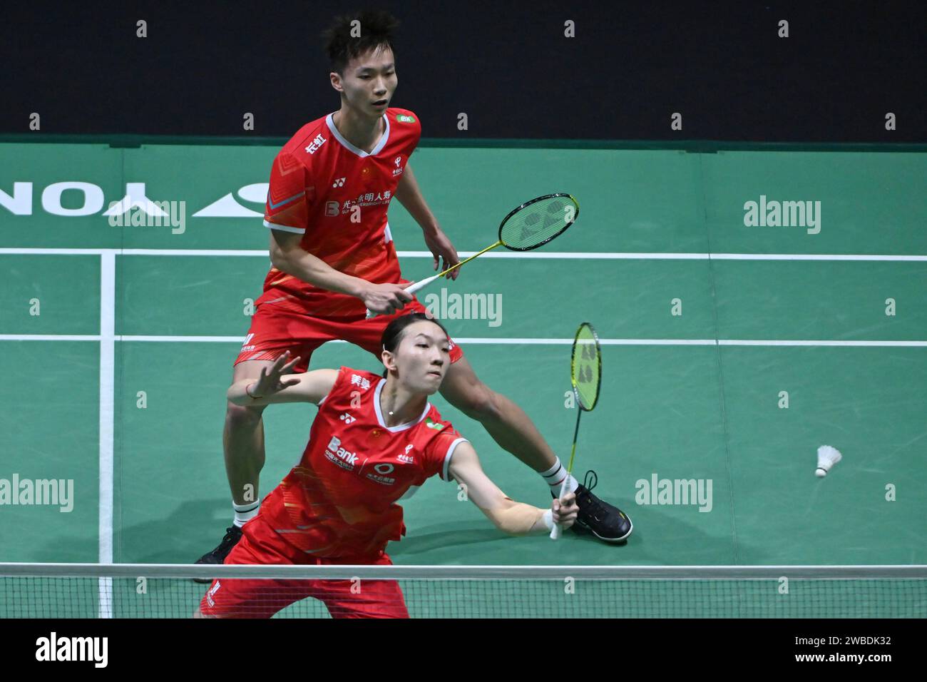Kuala Lumpur, Malaysia. 10th Jan, 2024. Jiang Zhenbang (top)/Wei Yaxin compete during the mixed ...