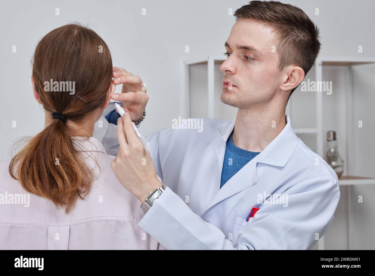 The doctor surgeon is preparing for the operation Otoplasty, Ear ...