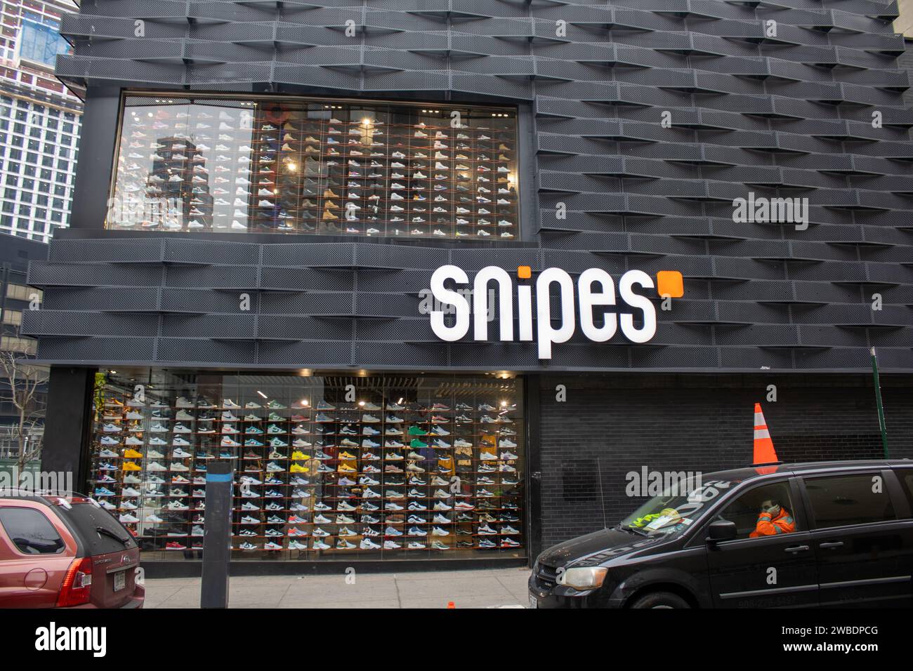 A vibrant outdoor storefront of Snipes in New York, United States Stock ...