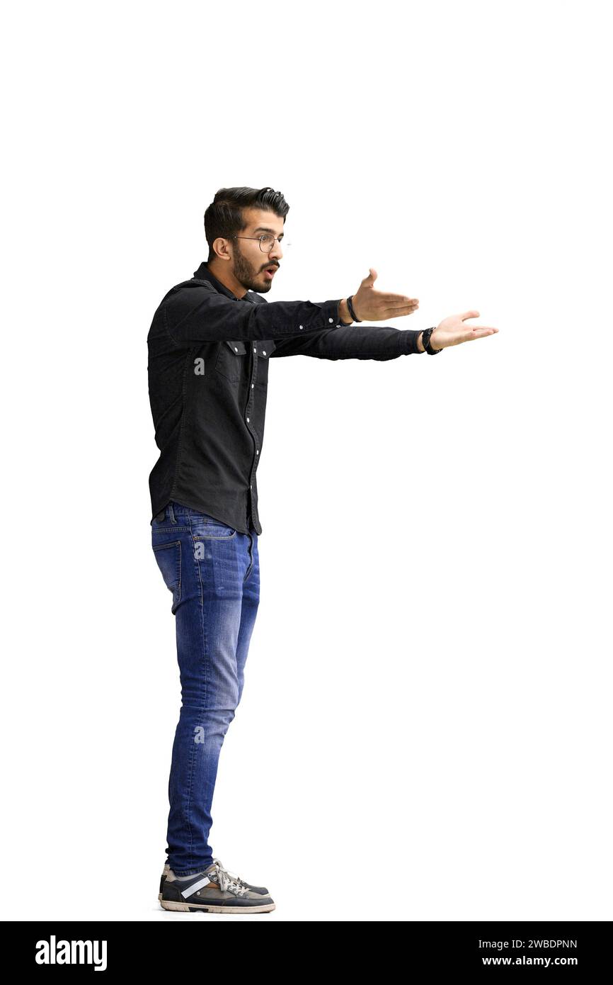 A man, on a white background, in full height, spreads his arms Stock ...