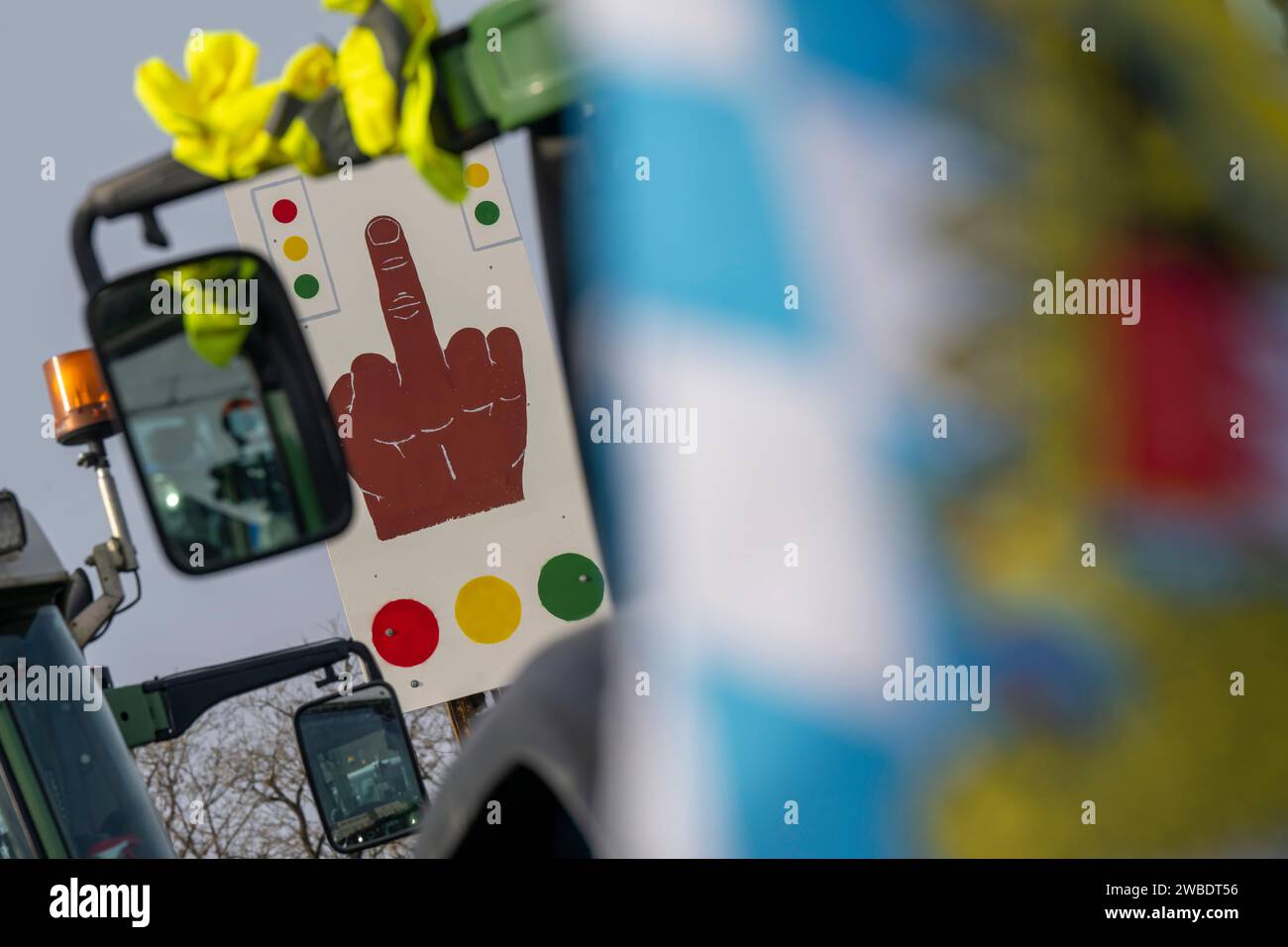 Augsburg, Germany. 10th Jan, 2024. With self-painted posters and ...