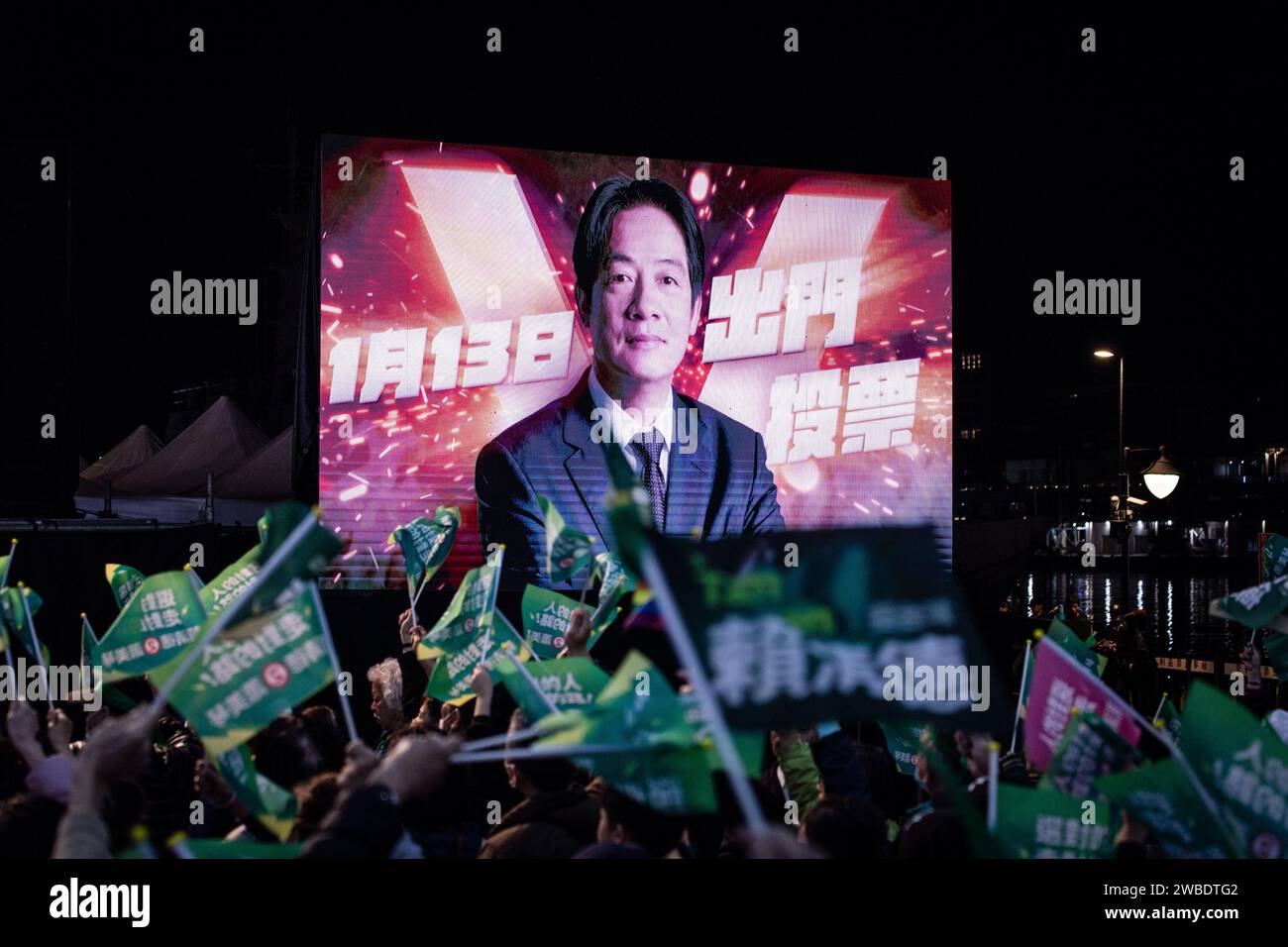 Keelung, Taiwan. 08th Jan, 2024. Supporters wave flags during the ...