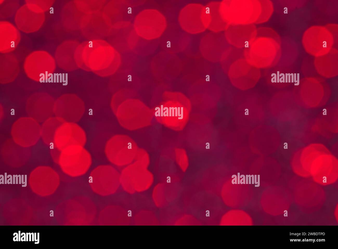 Red solid color background with light pattern as photo Stock Photo - Alamy