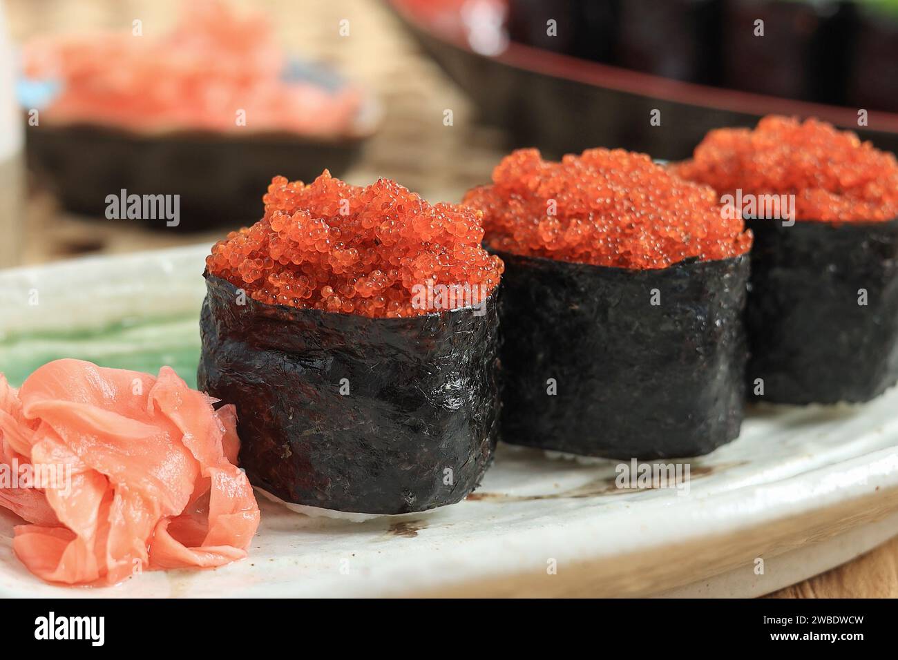 Close Up Gunkan Sushi with Tobiko, Flying Fish Roe. Nori wrapped Flying ...