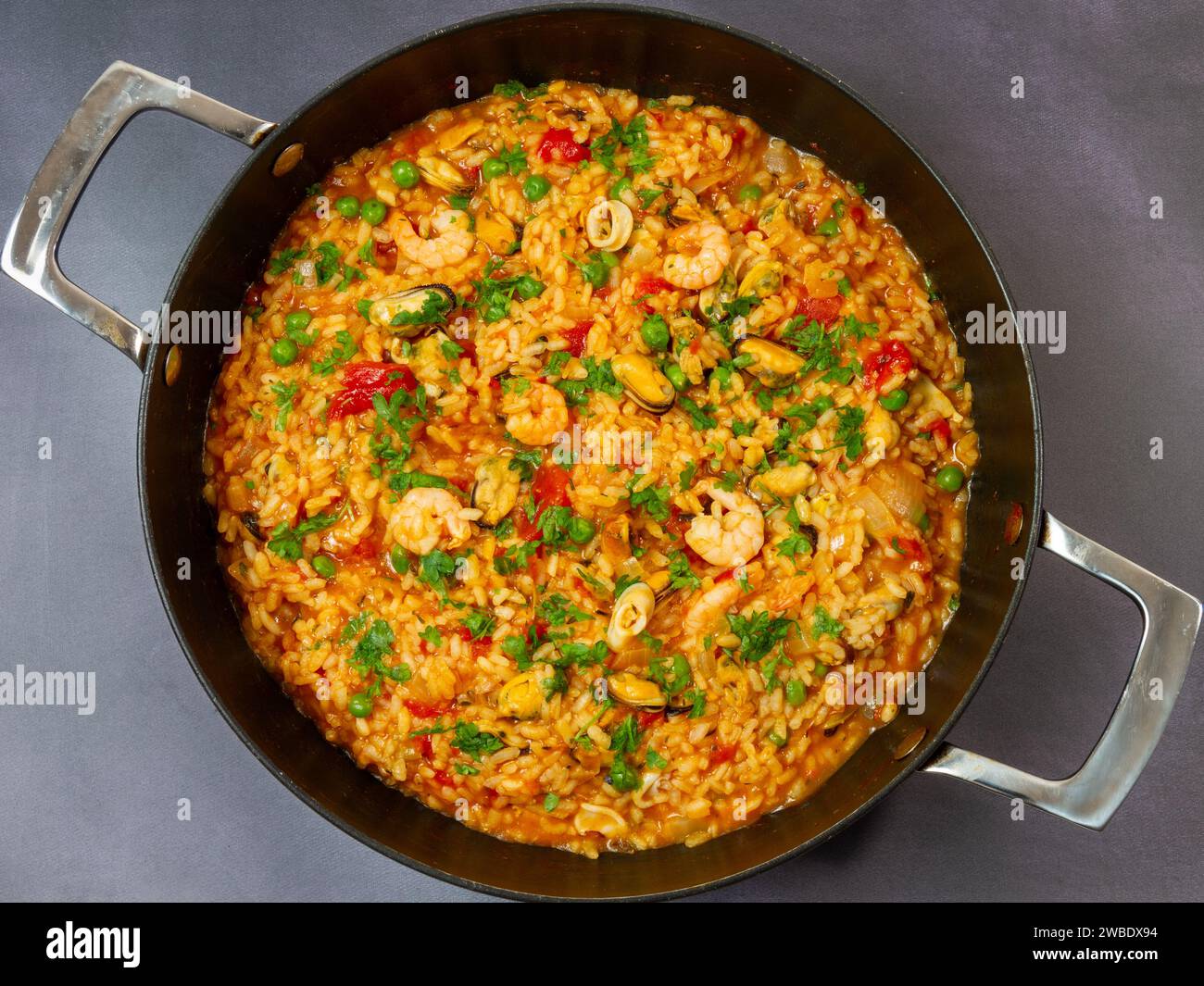 Seafood Paella, in pan, from above Stock Photo - Alamy