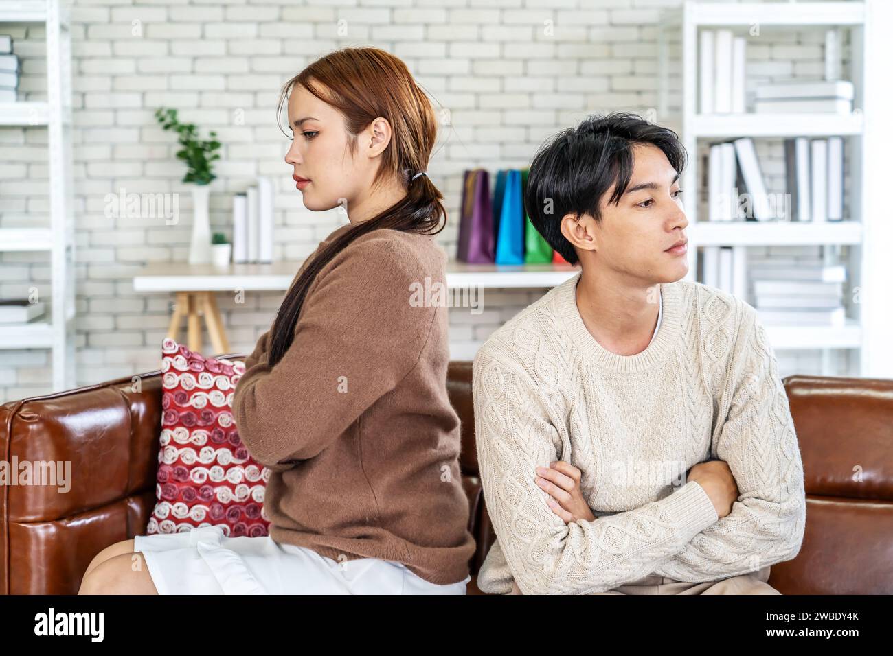 Photo of resentful asian guy and girl acting like arguing couple and ...