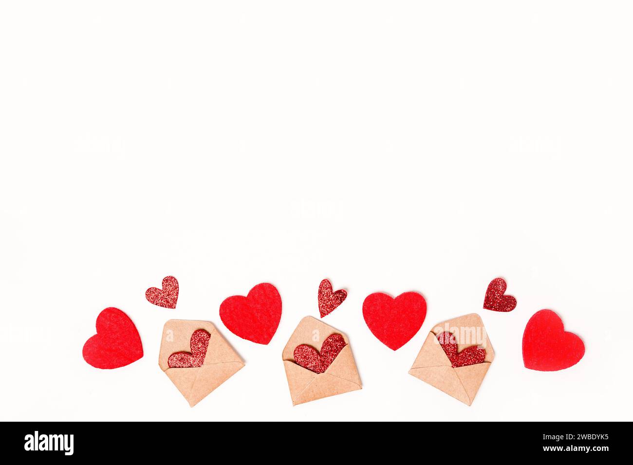 Red hearts and envelopes on white background. Mail concept. Valentine's ...