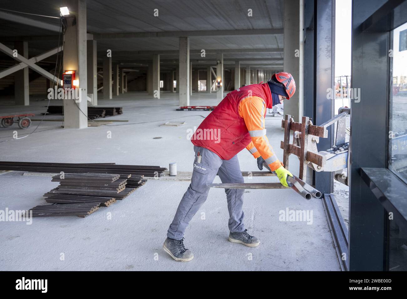 LEEUWARDEN - Construction workers take a break during their work at the ...