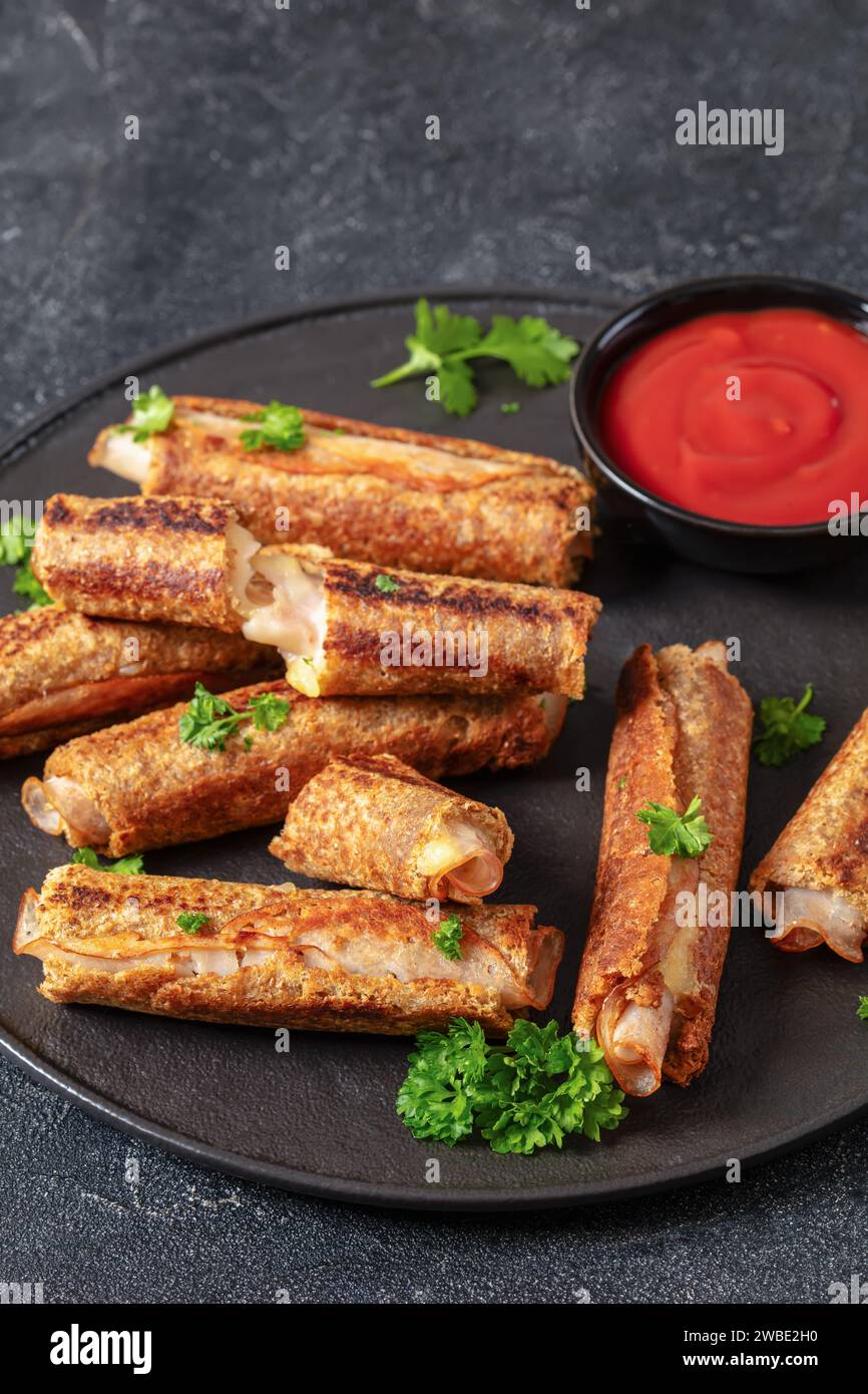 ham and cheese french whole wheat toast roll ups served with tomato ...