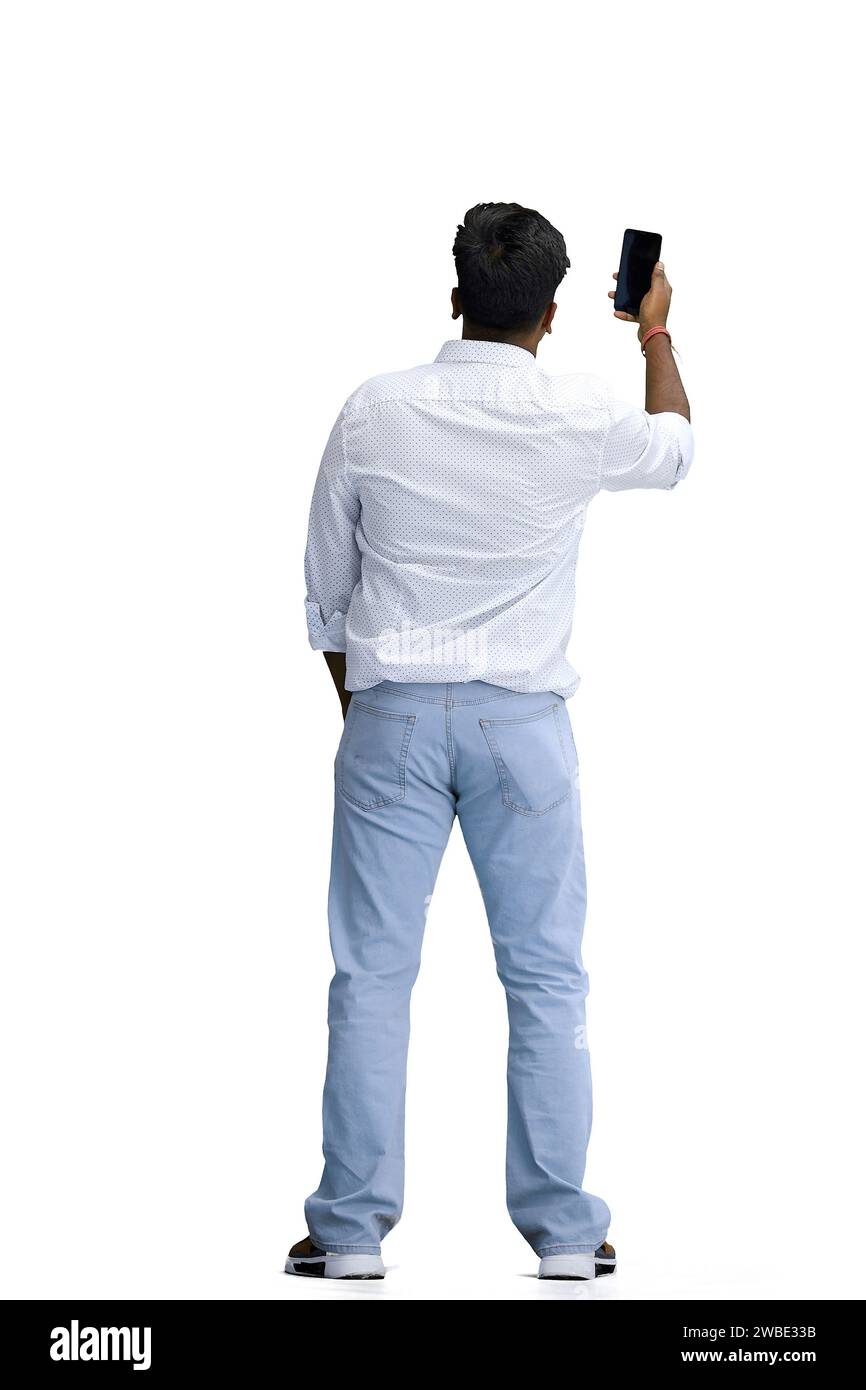 A man in a white shirt, on a white background, in full height, waving ...