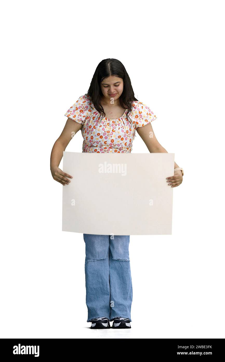 A woman, on a white background, in full height, holding a white sheet ...