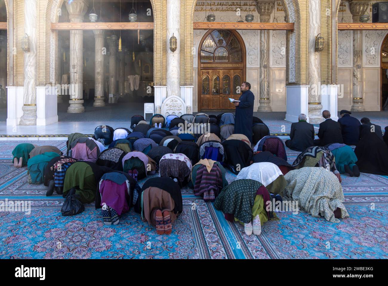 female pilgrims praying in the courtyard of the Great Mosque of Kufa ...