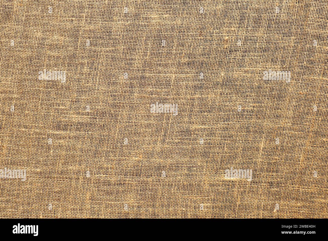 Jute fabric sackcloth burlap texture background beige cream brown color Stock Photo - Alamy