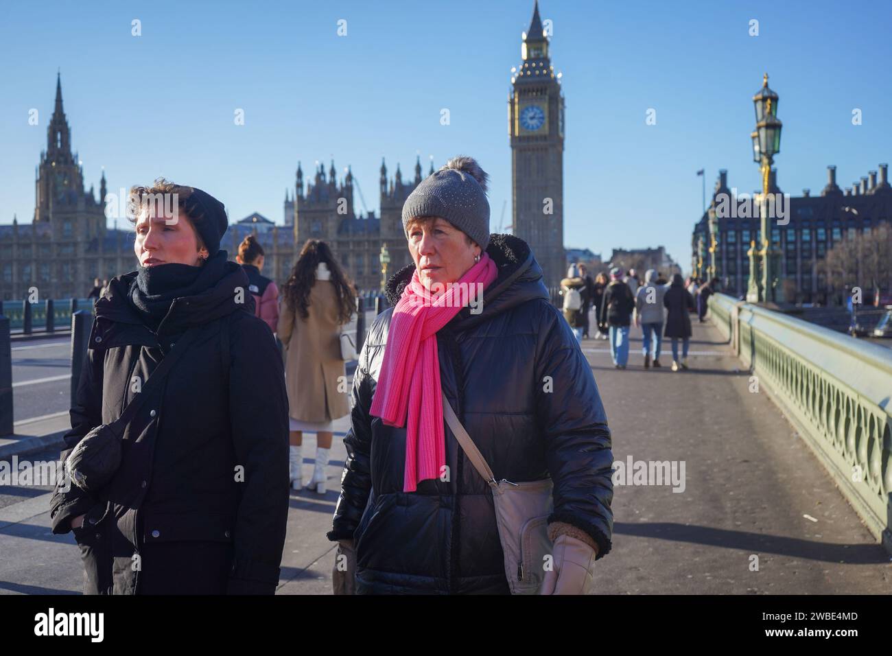 London, UK. 10 January 2024. . Pedestrians walking in the bright ...