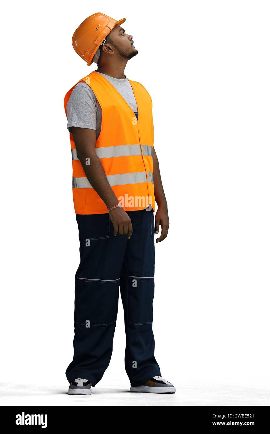 A male construction worker, on a white background, in full height, look ...