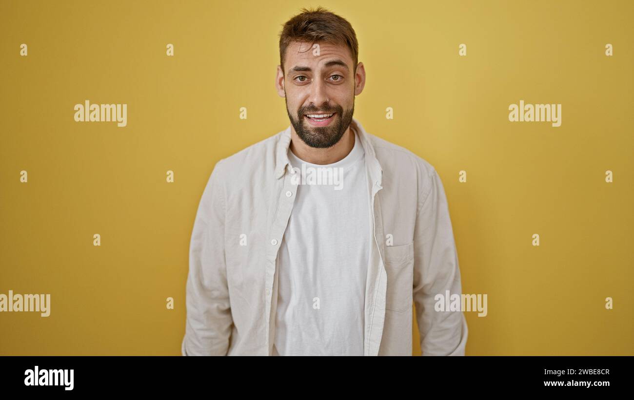 Cool and casual young hispanic man oozing serious, relaxed concentrate ...