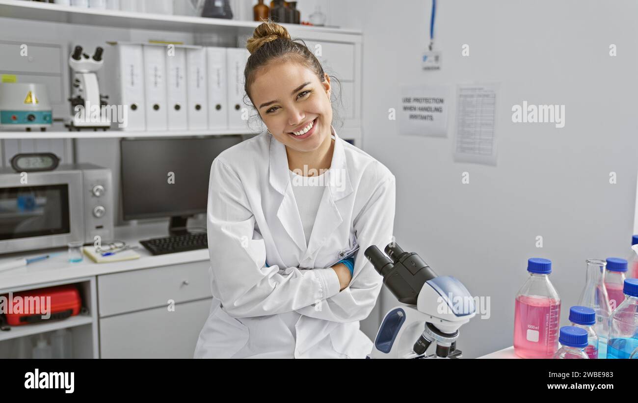 Smiling young hispanic scientist woman, beautiful and professional ...